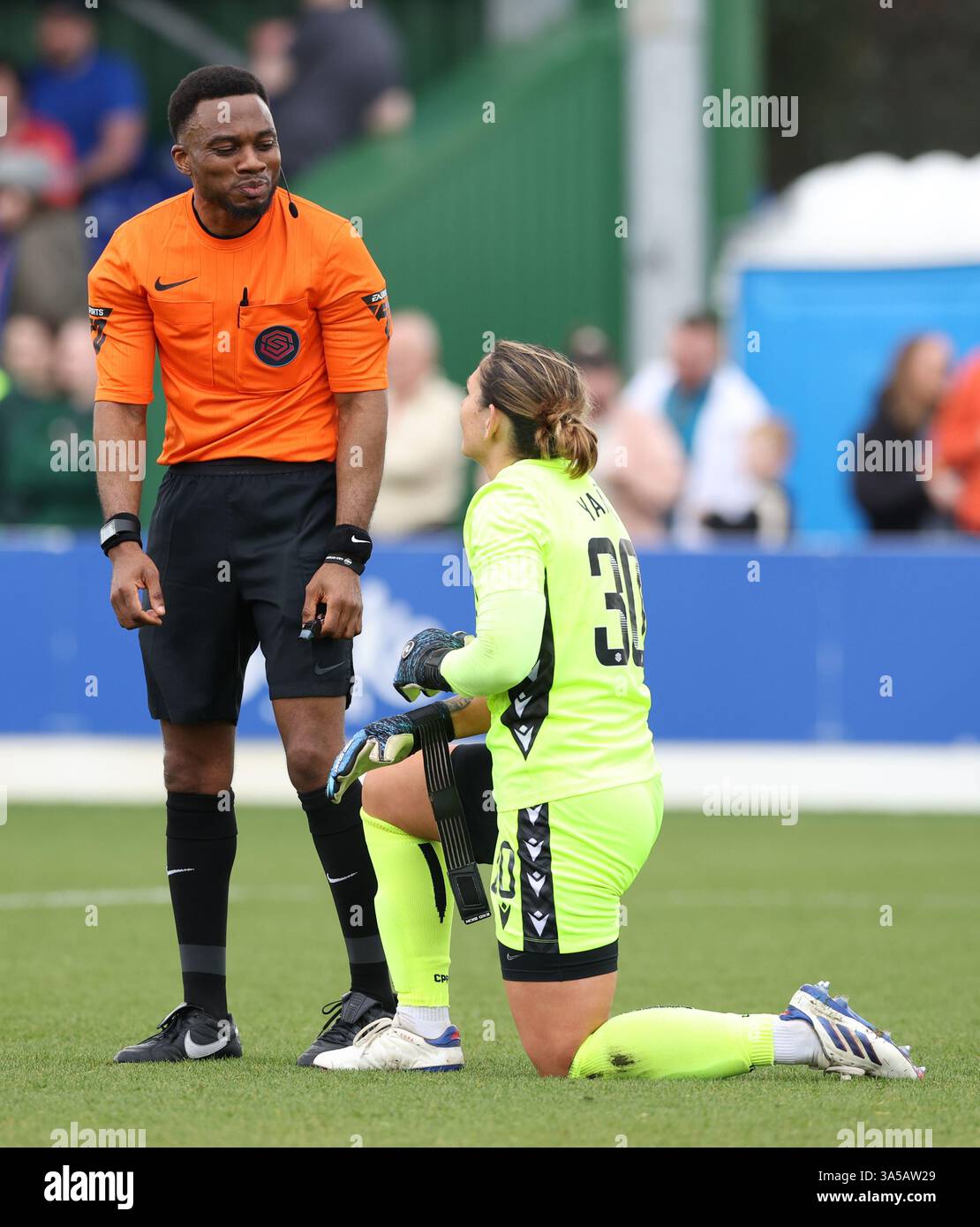 Referee Adewunmi Soneye checks on Crystal Palace goalkeeper Shae Yanez ...