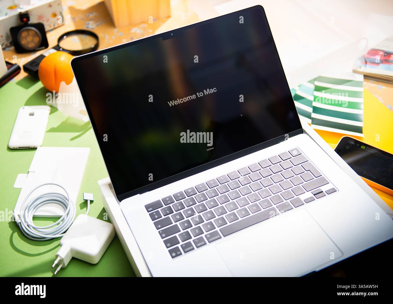 Paris, France - Mar 13, 2025: MacBook Air M4 displays Welcome to Mac on ...