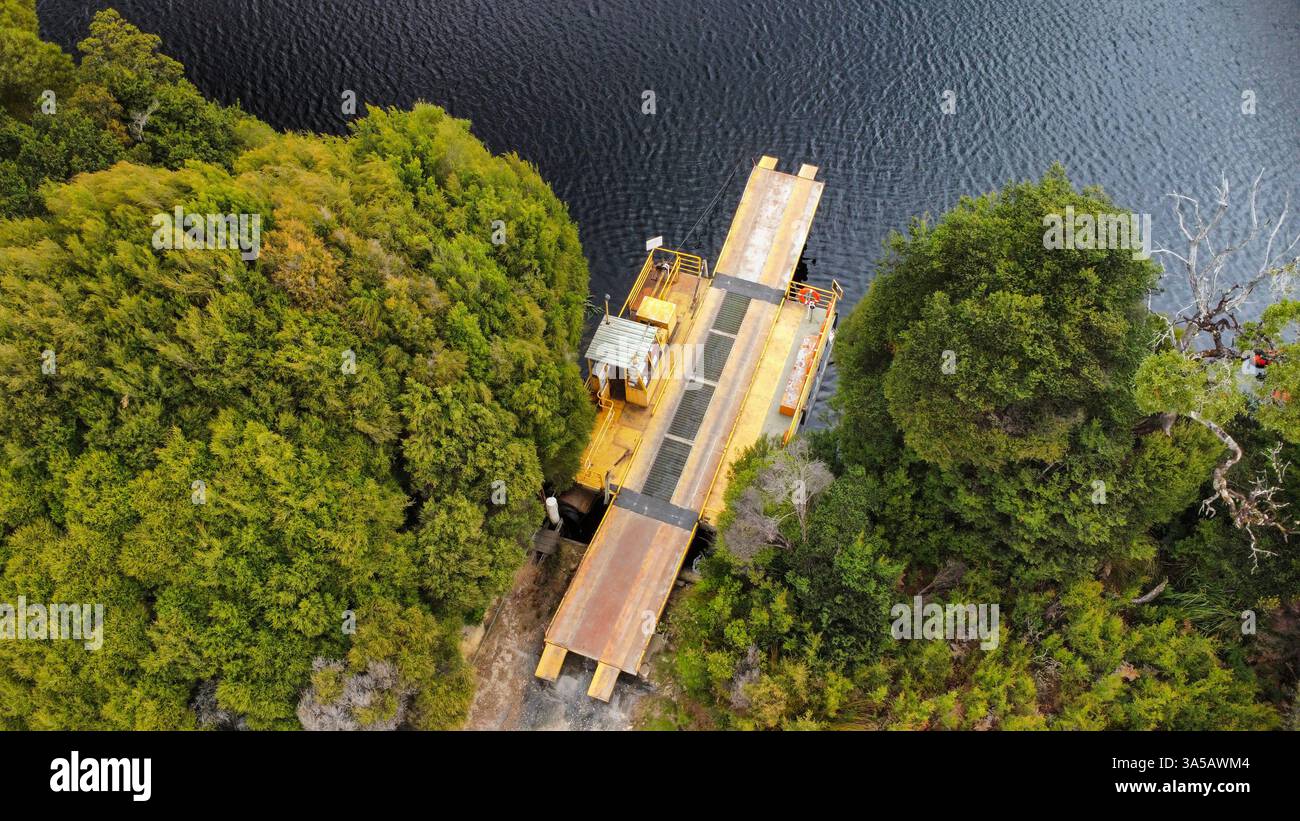 Small ferry on a river in Tasmania, seen from above Stock Photo - Alamy