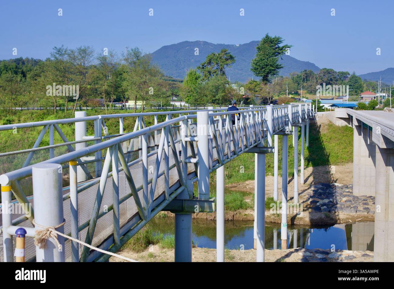 Naju City, South Korea - September 24, 2020: A cyclist rides along an ...