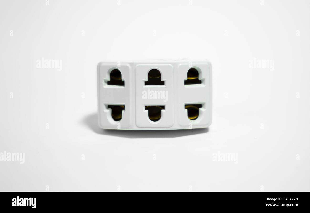 Universal Travel Adapter with Multiple Plug Options isolated on white ...