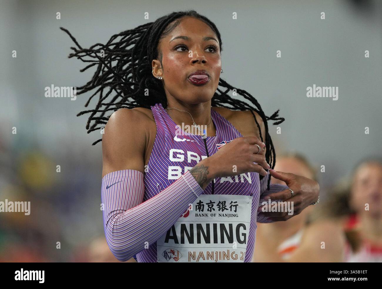 Nanjing, China's Jiangsu Province. 22nd Mar, 2025. Amber Anning of Britain reacts after the ...