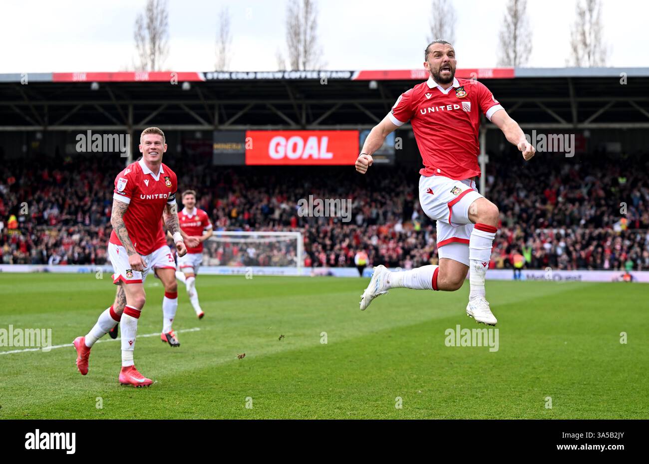 Wrexham's Jay Rodriguez celebrates scoring their side's first goal of ...