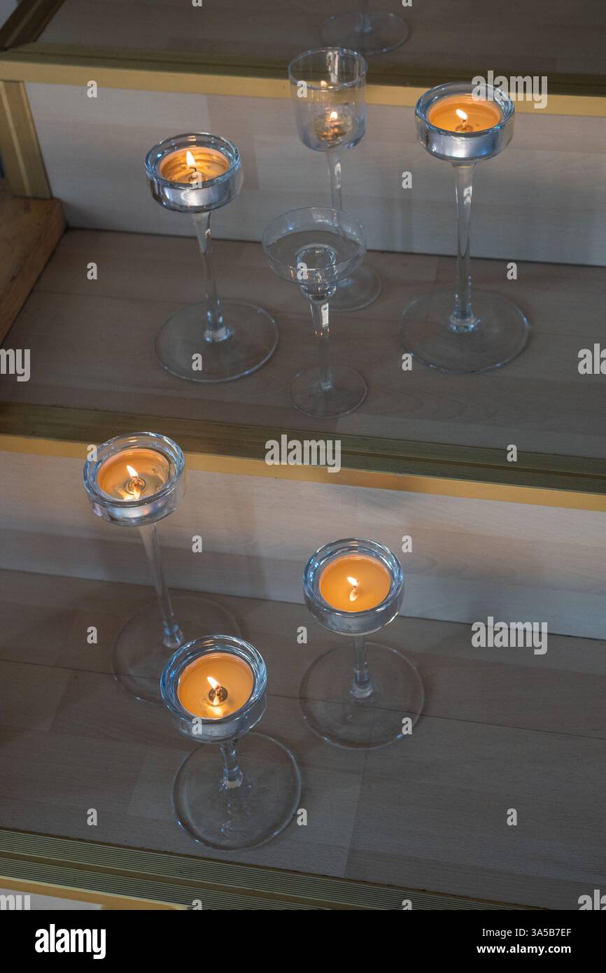 Burning candles on a steps in the room. View from above Stock Photo - Alamy
