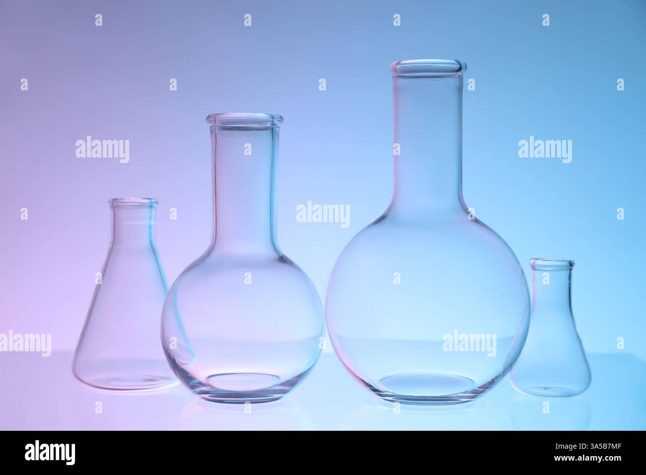 Empty flasks on color hi-res stock photography and images - Alamy