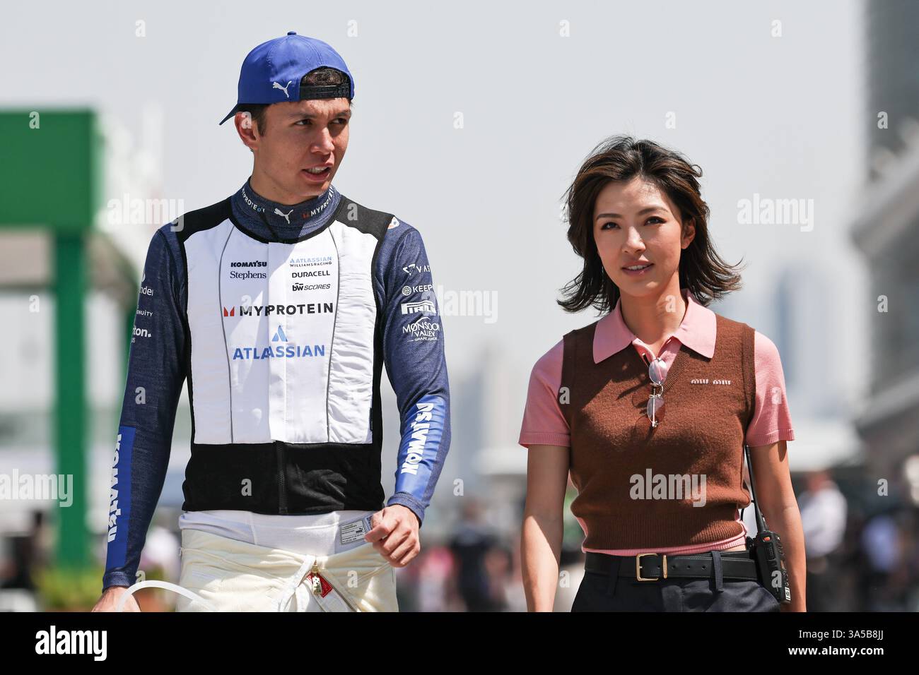 SHANGHAI, CHINA- MARCH 22: Alexander Albon of Thailand and Atlassian Williams Racing walks with ...