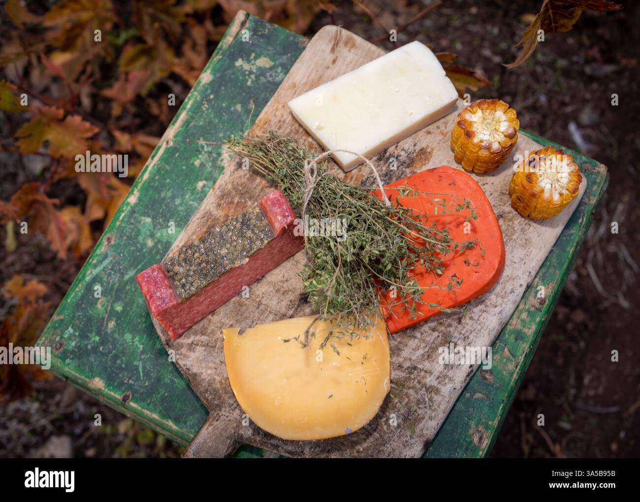 Assorted Cheese Selection with Baked Corn – A Rustic Delight Stock ...