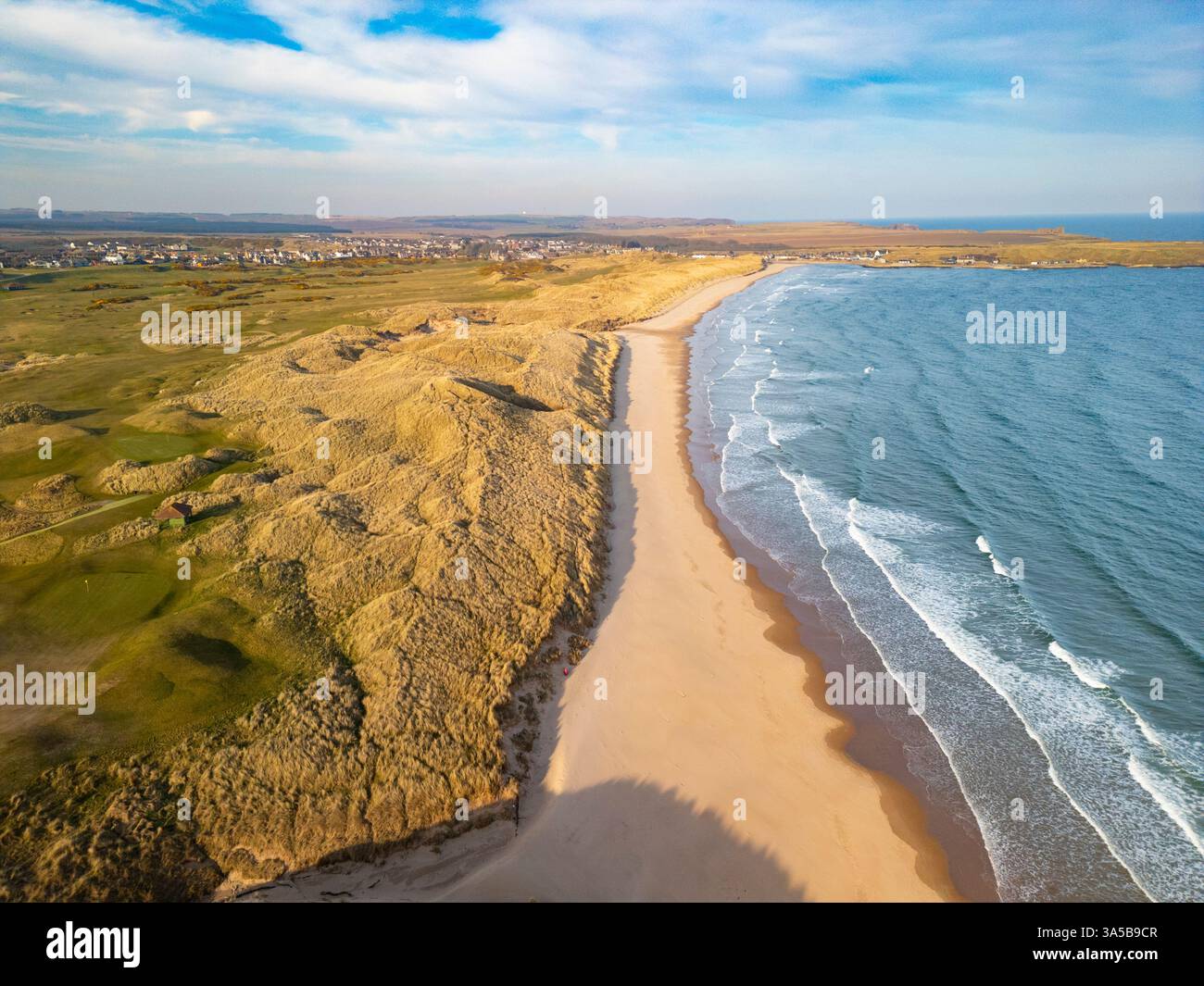Aerial view from drone of beach and golf course at Cruden Bay ...