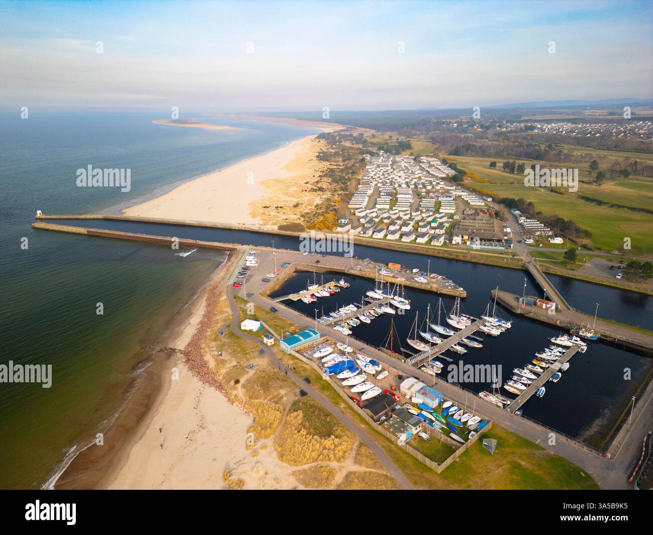 Aerial view of seafront, harbour and marina and beach at Nairn ...
