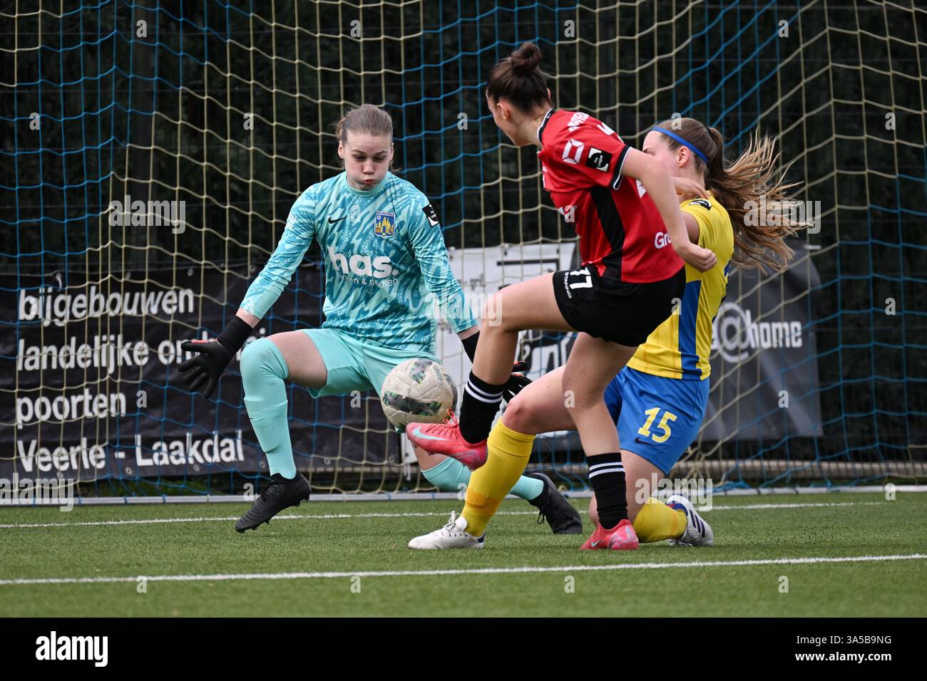 Lise Van Gemert (99) goalkeeper of KVC Westerlo battles for the ball ...