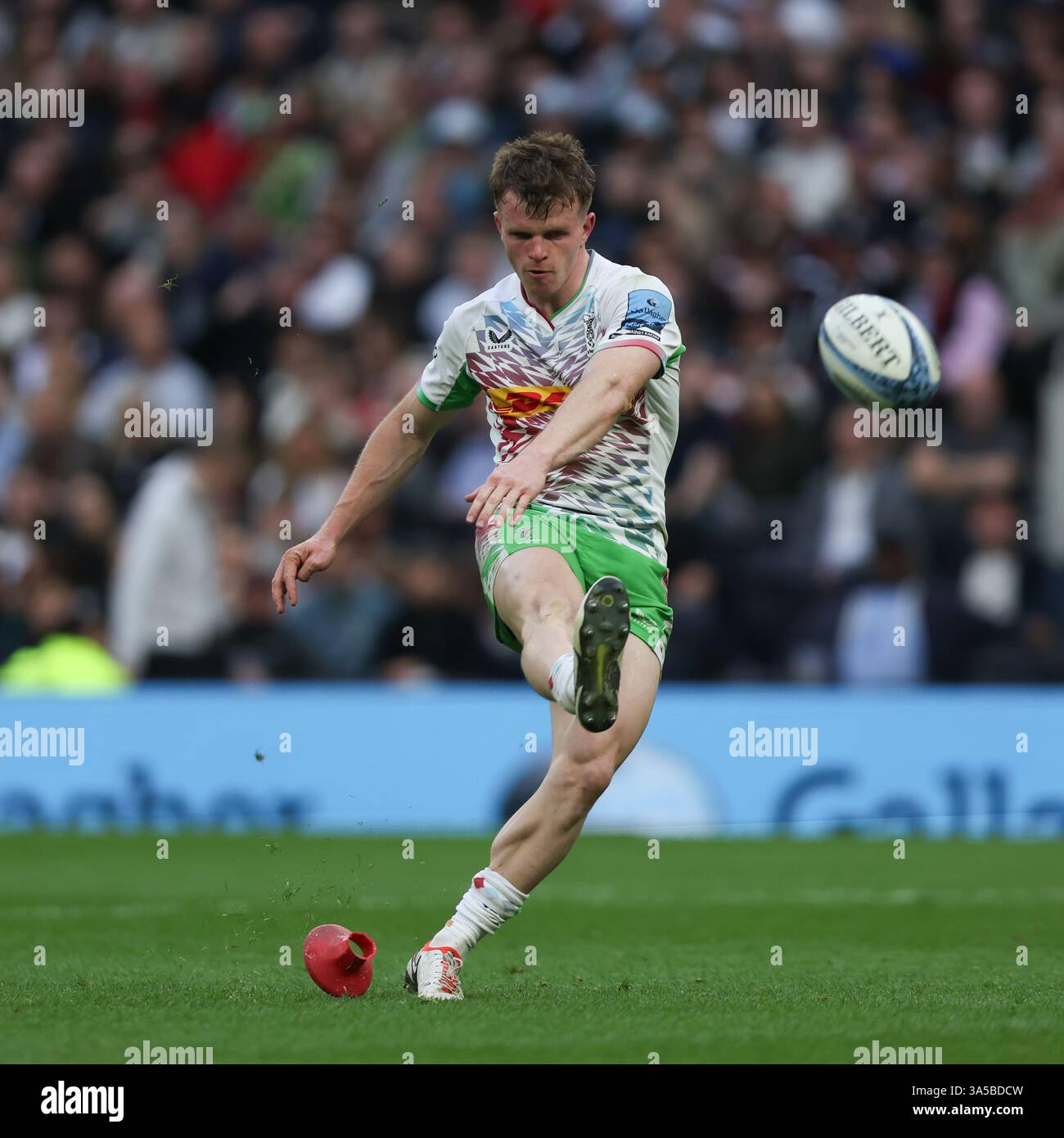 Jamie Benson of Harlequins scores a conversion to make the score 12-7 ...