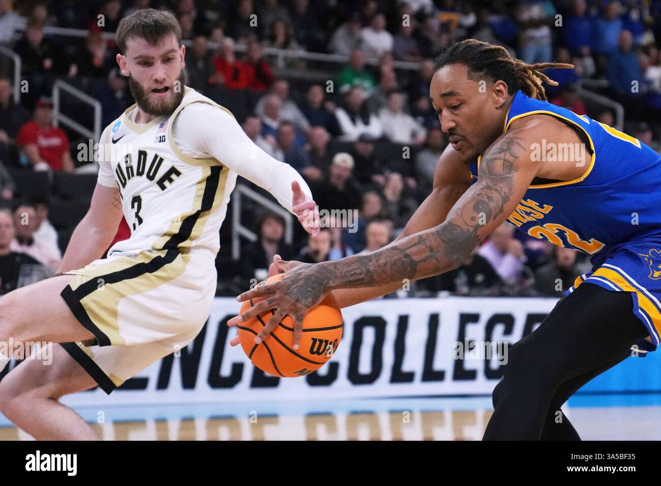McNeese State forward Christian Shumate, right, grabs a loose ball ...