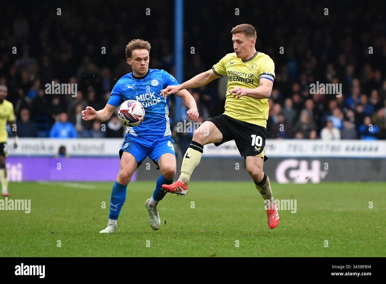 Peterborough, England. 22nd Mar 2025. Greg Docherty and Archie Collins ...