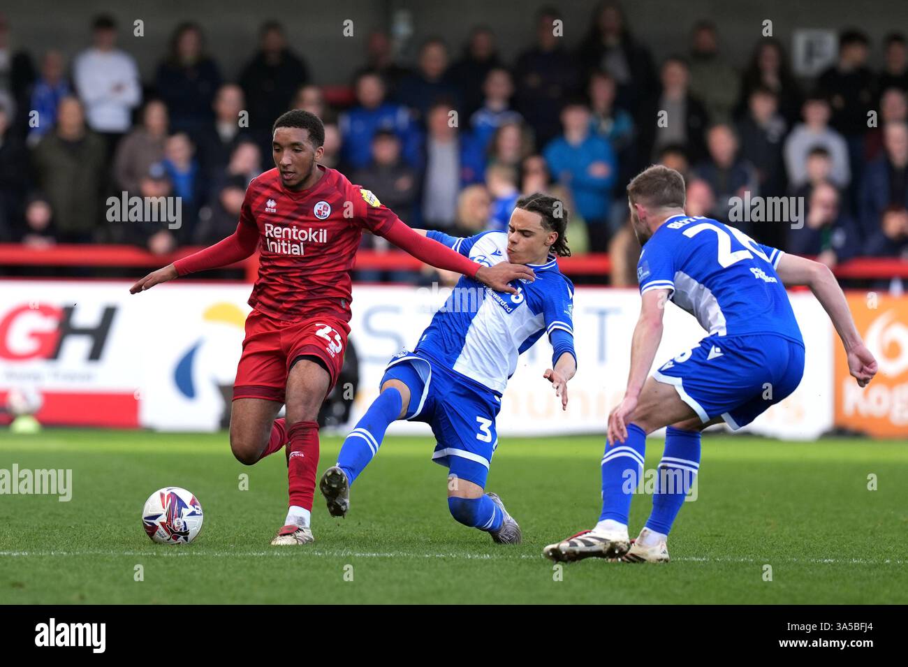 Crawley Town's Bradley Ibrahim (left) is tackled by Bristol Rovers ...