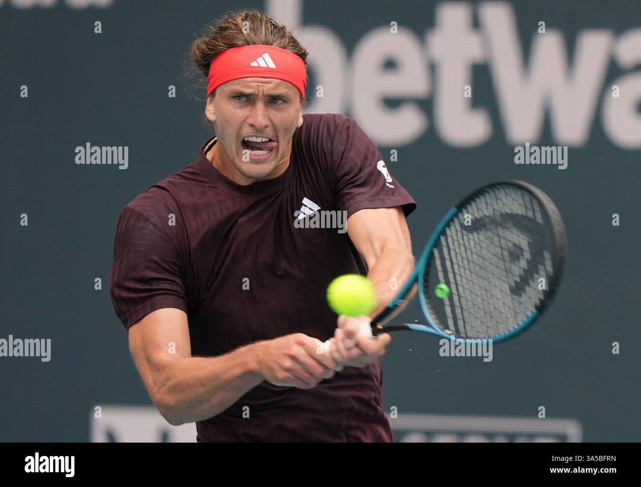 Alexander Zverev, of Germany, hits return to Jacob Fearnley, of Great Britain, during the Miami ...
