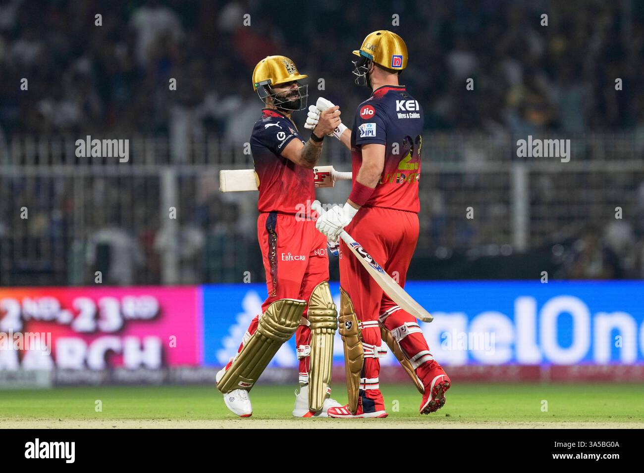 Royal Challengers Bengaluru's Virat Kohli, left, and batting partner ...