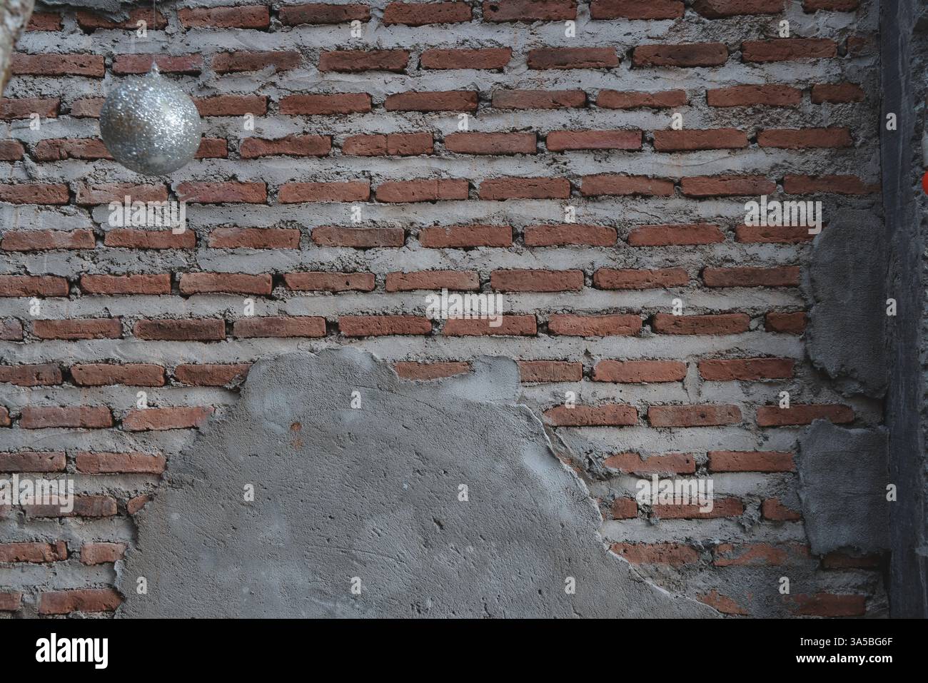 A beautifully textured brick wall that showcases plaster and natural ...