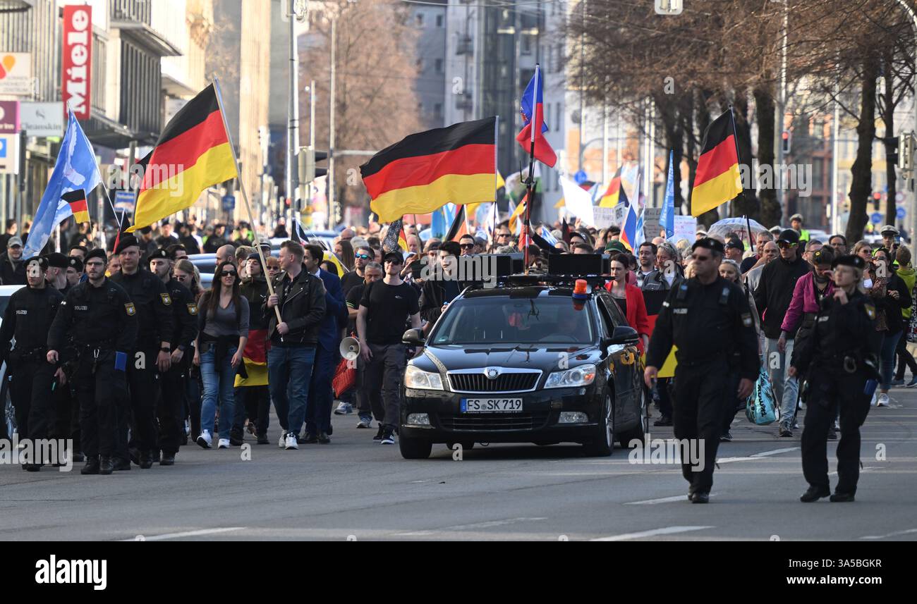 Munich, Germany. 22nd Mar, 2025. Demonstrators march through ...