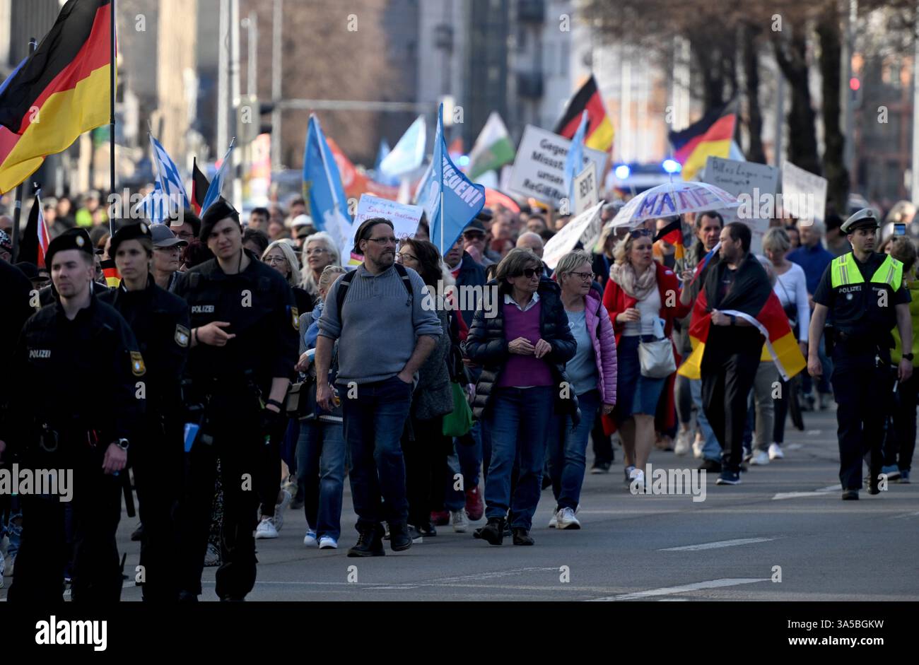 Munich, Germany. 22nd Mar, 2025. Demonstrators march through ...