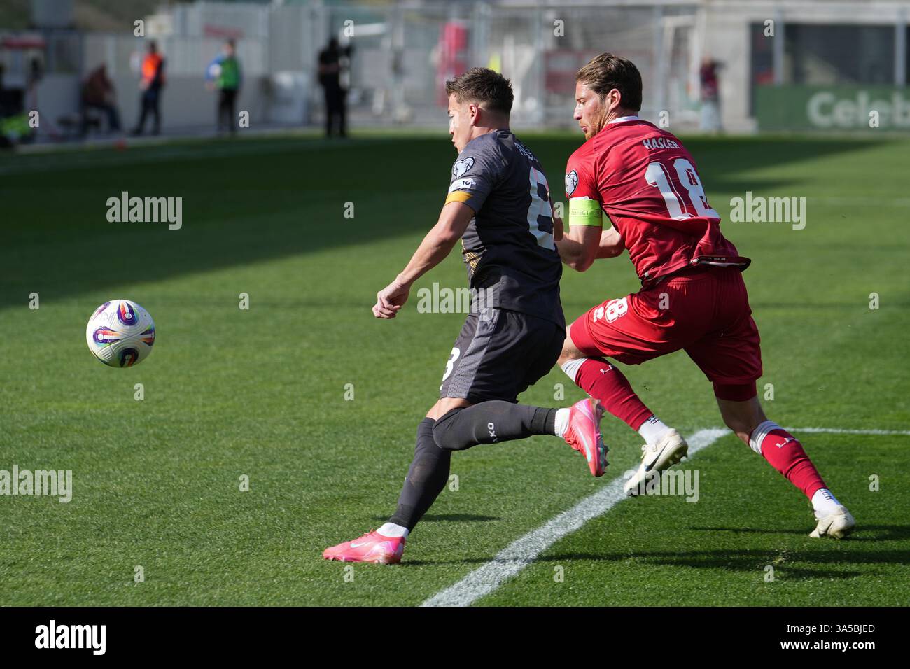 Nicolas Hasler (18 LIE) and Ezgjan Alioski (8 MKD). European Qualifiers ...