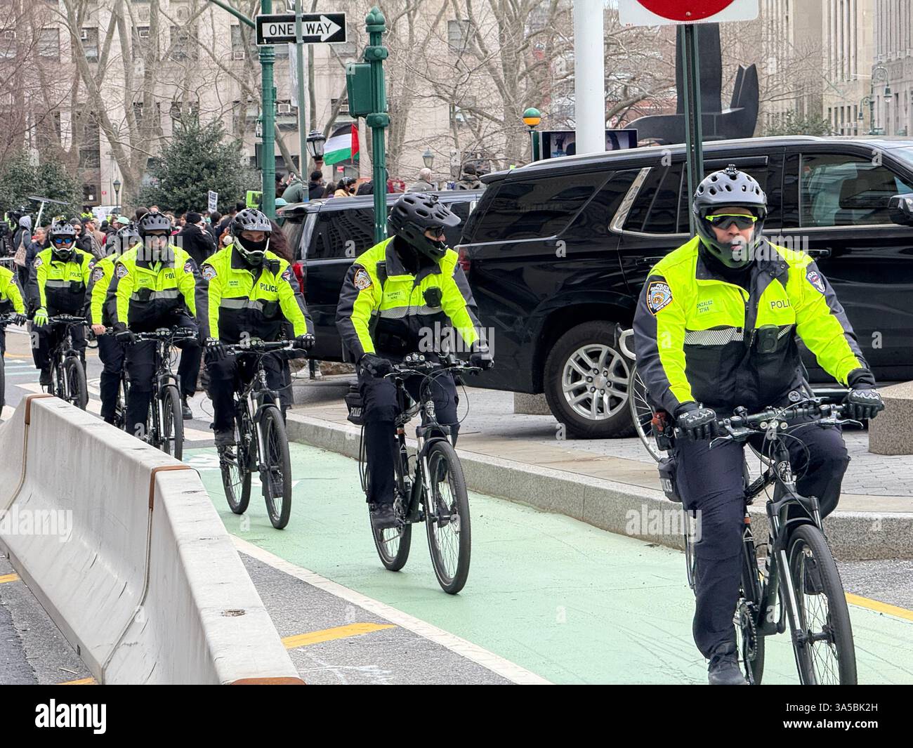 New York Police Department (NYPD) officers on bicycles along Center ...