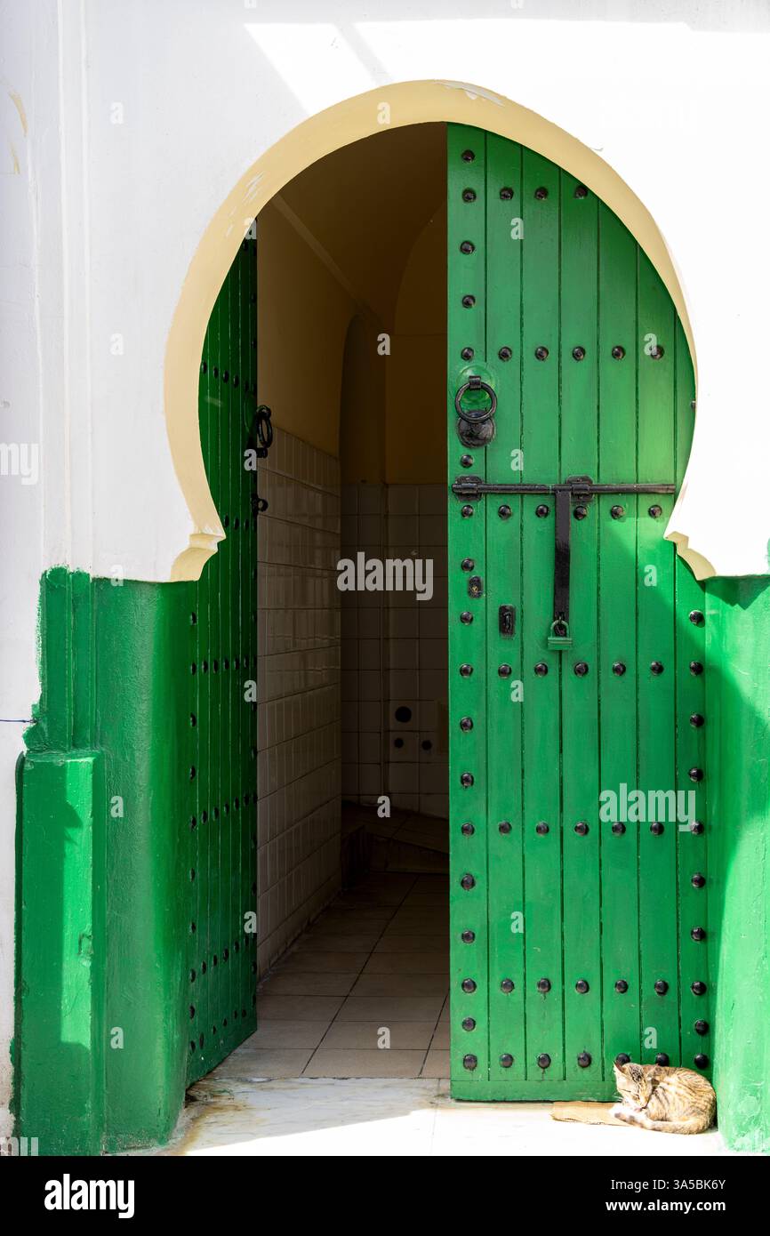 half-open door in the public baths of the medina, Tangier, Morocco ...