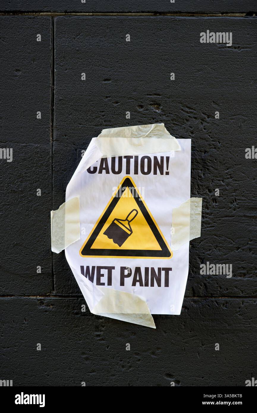 Caution Wet Paint sign, UK Stock Photo - Alamy