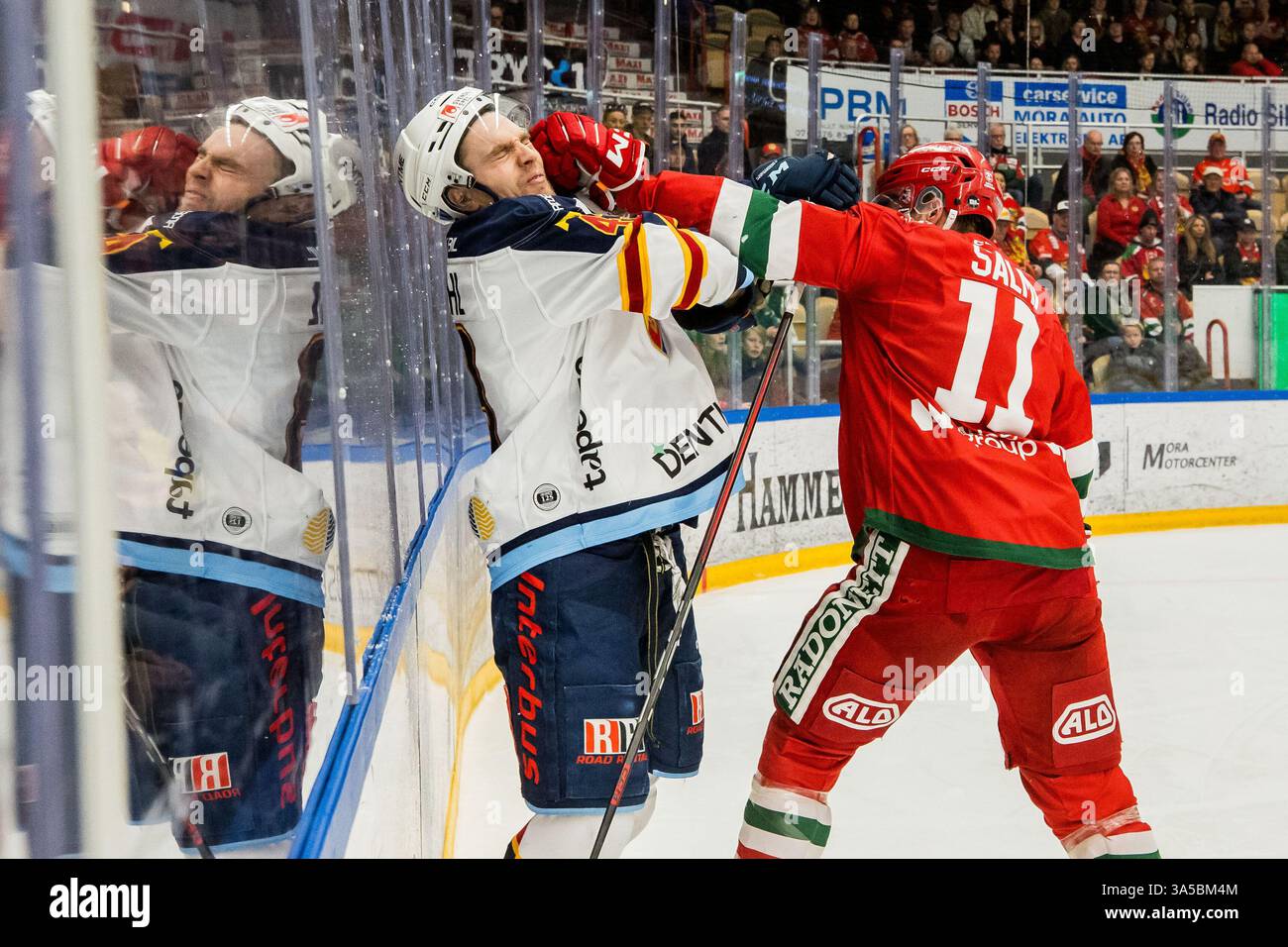 Mora, Sverige. 22nd Mar, 2025. 250322 Djurgårdens Max Krogdahl och Moras Gustav Salmi-Lilja ...