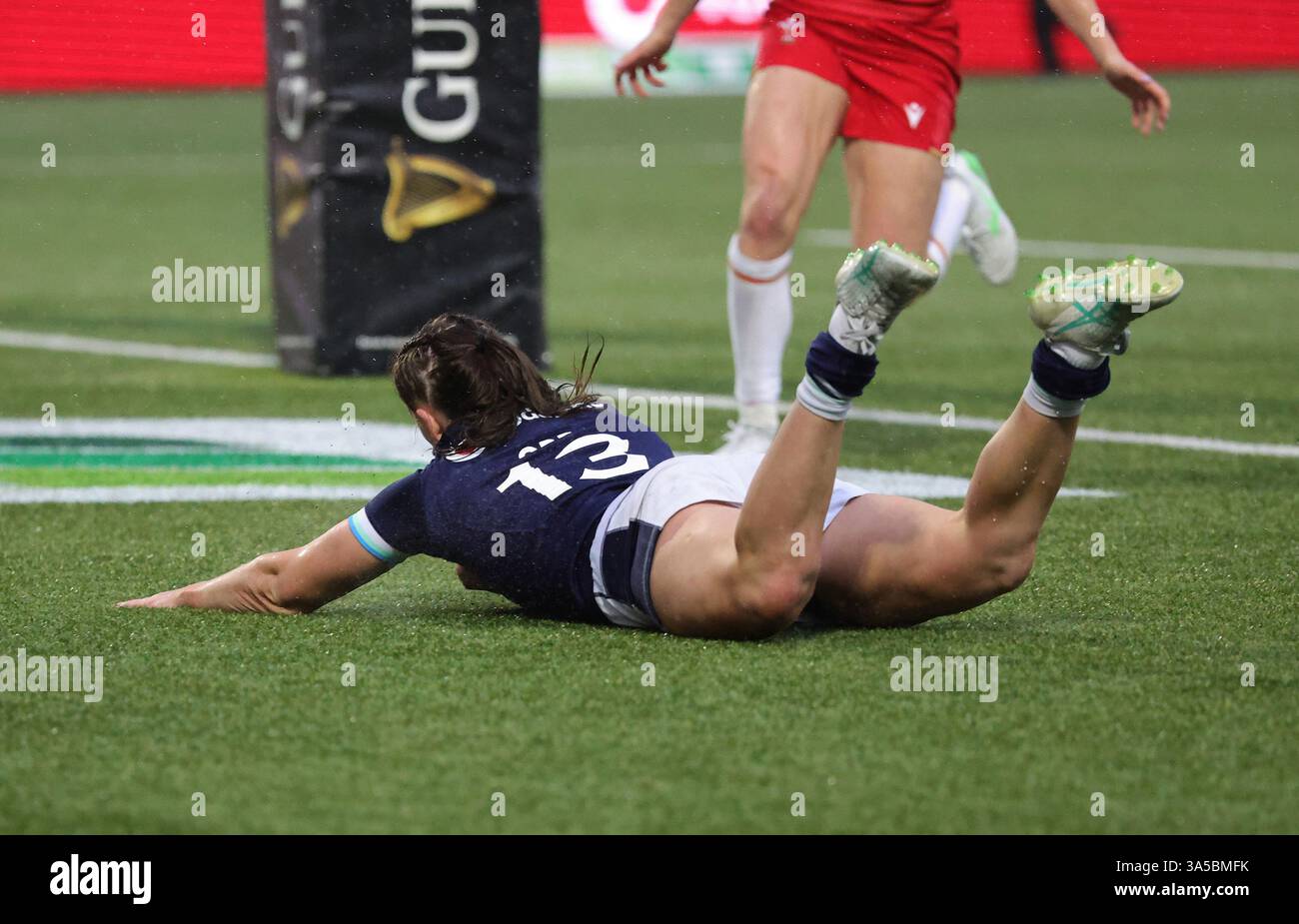 Scotland's Emma Orr scores their second try during the Guinness Women's ...