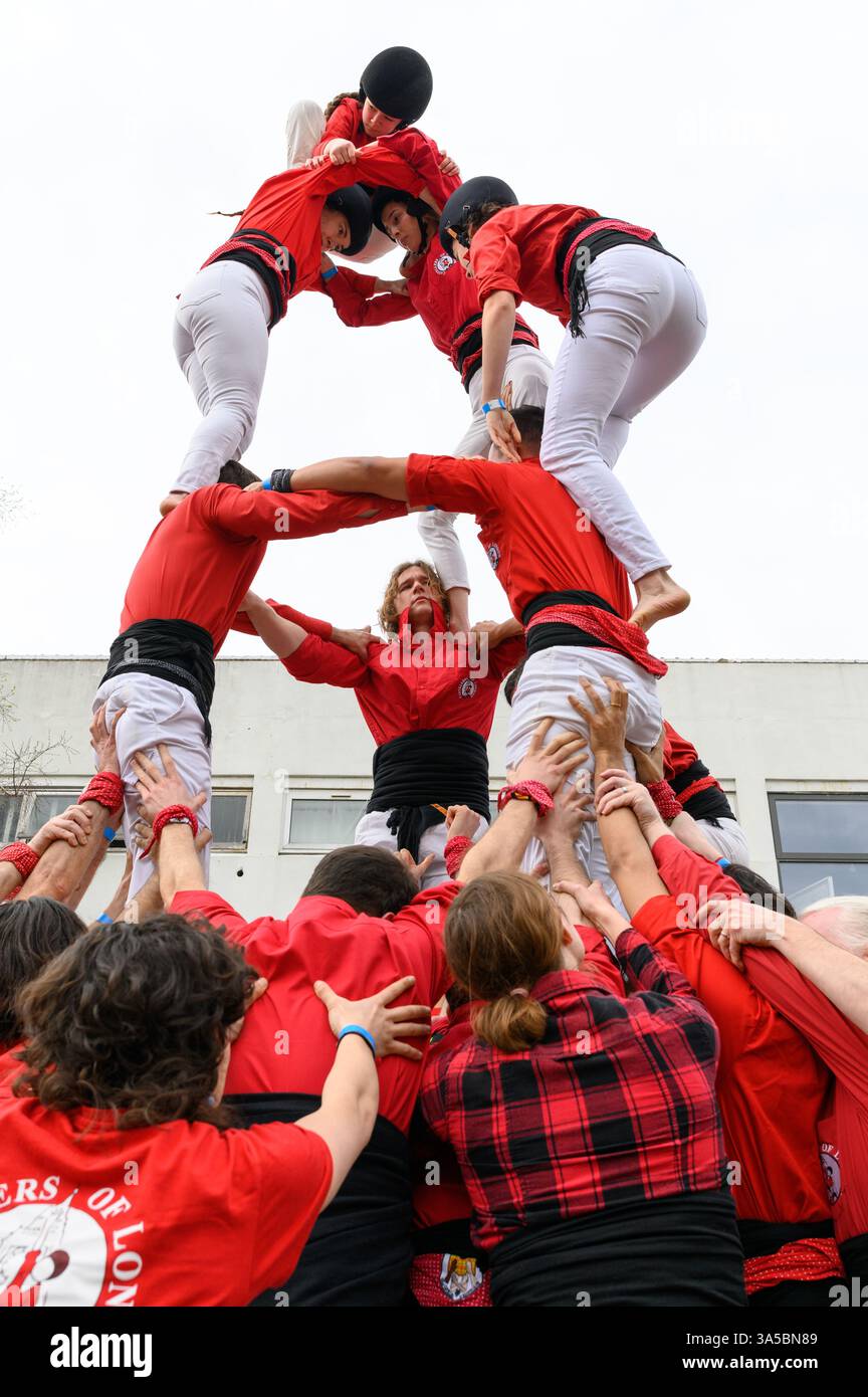 London, UK. 22 March 2025. Castellers of London build a human tower ...
