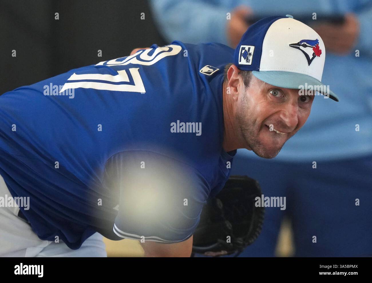 FILE - Toronto Blue Jays pitcher Max Scherzer throws a pitching session ...