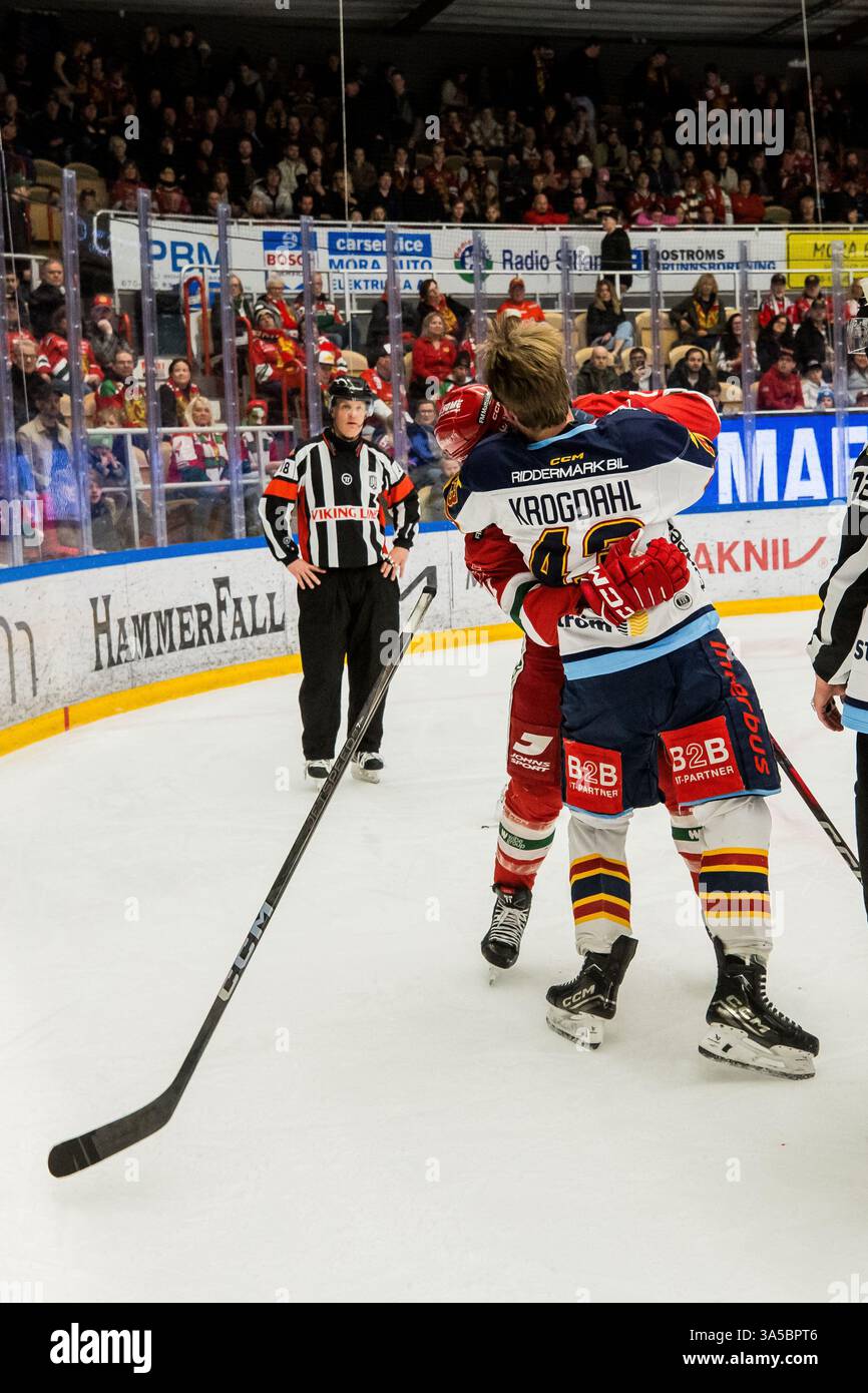Mora, Sverige. 22nd Mar, 2025. 250322 Moras Gustav Salmi-Lilja och Djurgårdens Max Krogdahl ...