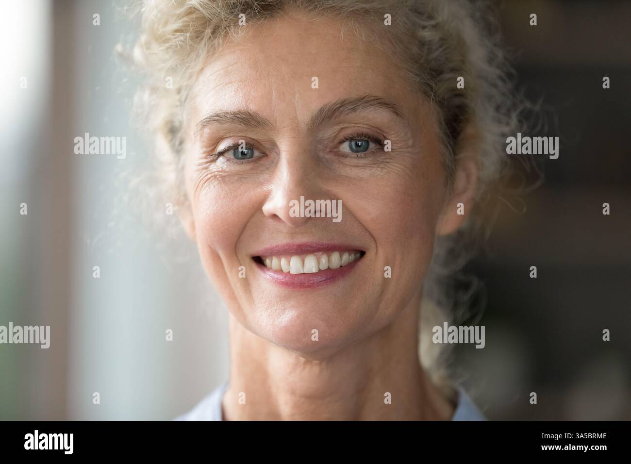 Beautiful face happy older woman looking at camera with smile Stock Photo - Alamy