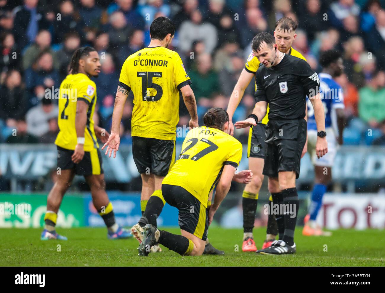 Chesterfield, UK. 22nd Mar, 2025. Referee Benjamin Speedie speaks to ...