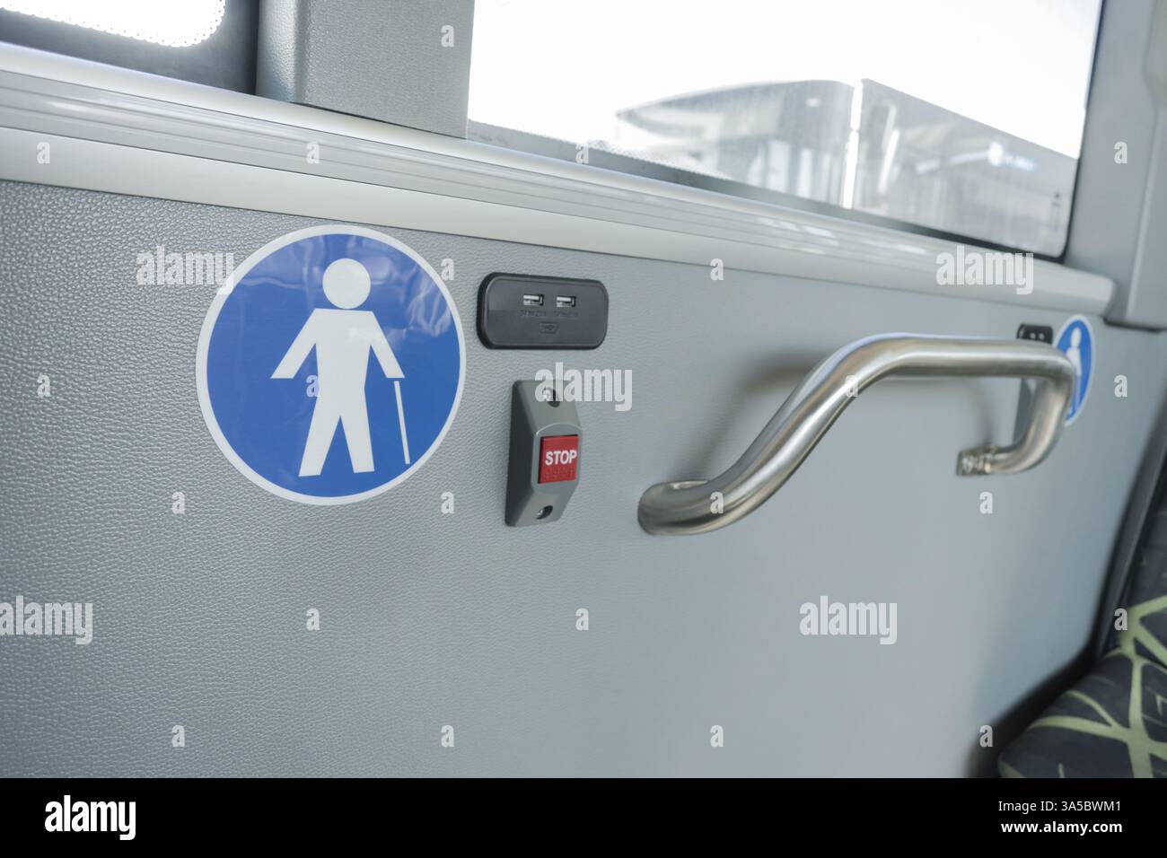 Reserved seat for elderly people inside a bus Stock Photo - Alamy