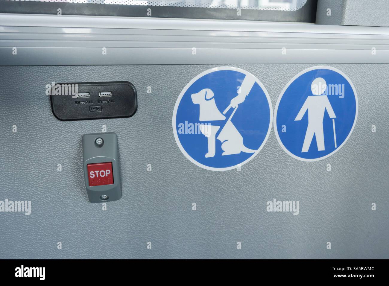Reserved seat for elderly or blind people inside a bus Stock Photo - Alamy