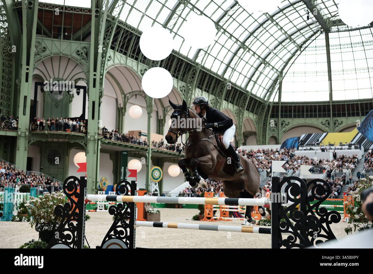 Martin FUCHS of Switzerland with Commissar pezi during the Saut Hermès at the Saut Hermès on ...