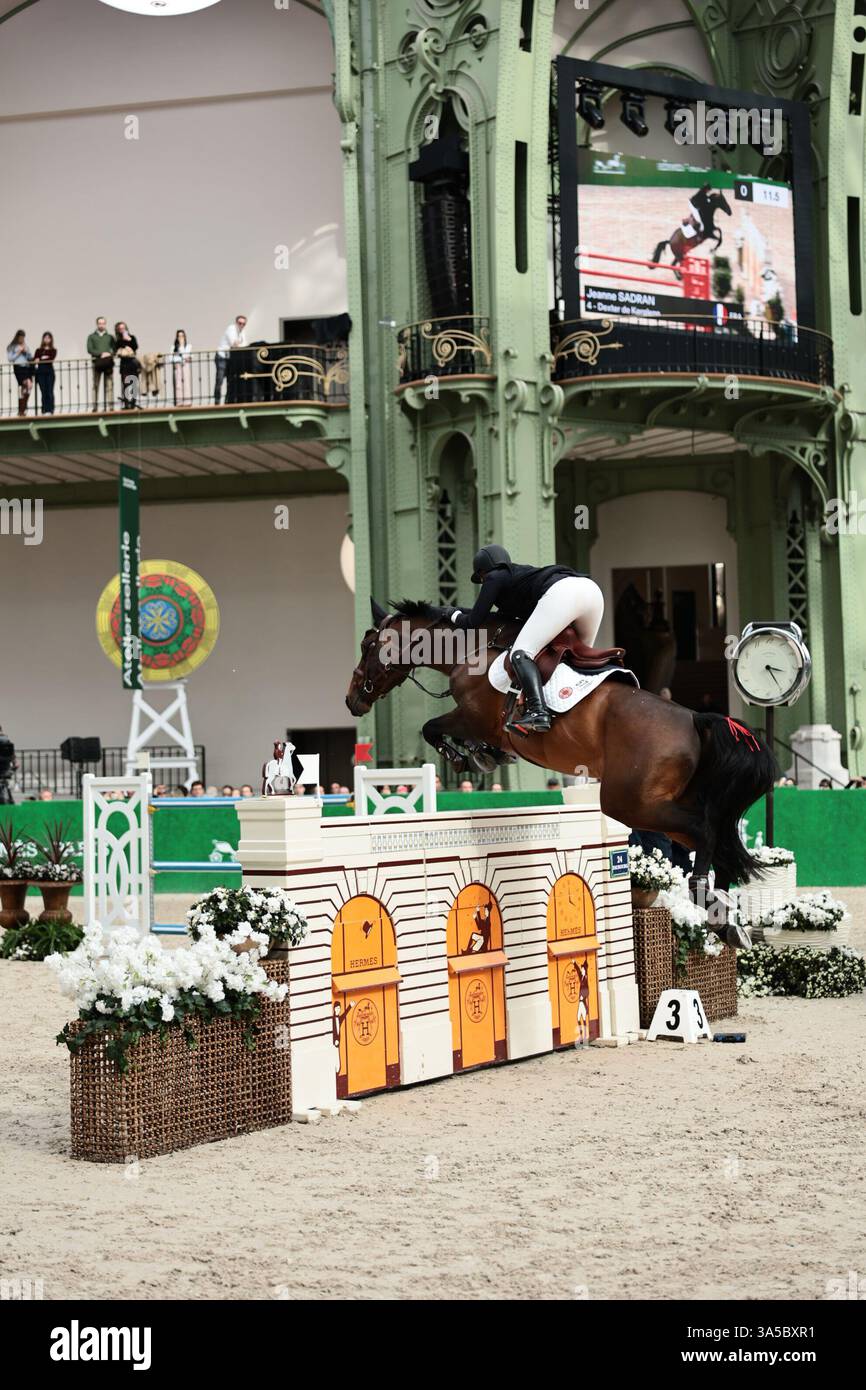Jeanne SADRAN of France with Dexter de kerglenn during the Saut Hermès ...
