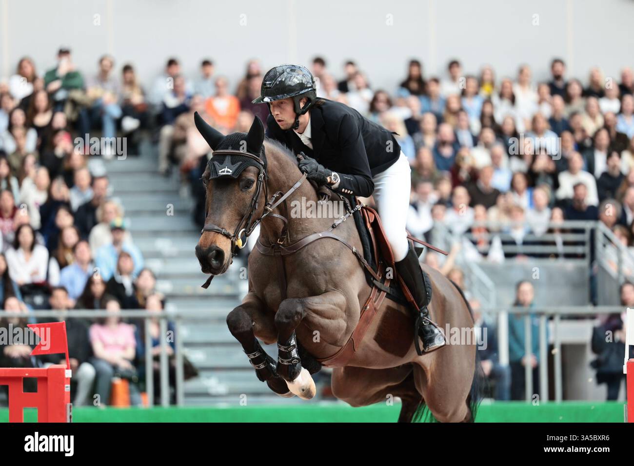 Martin FUCHS of Switzerland with Commissar pezi during the Saut Hermès at the Saut Hermès on ...