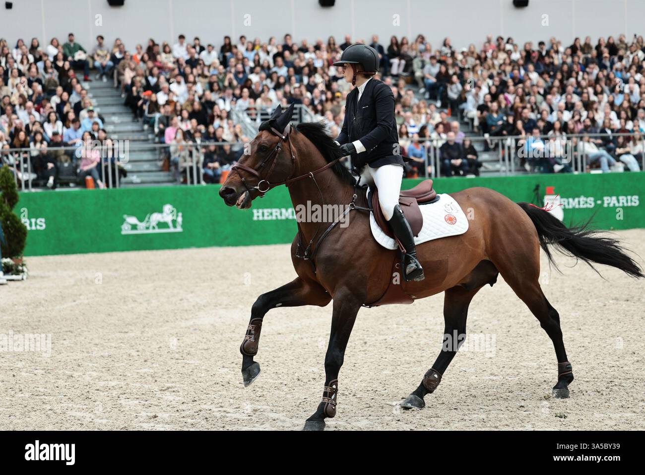 Jeanne SADRAN of France with Dexter de kerglenn during the Saut Hermès ...