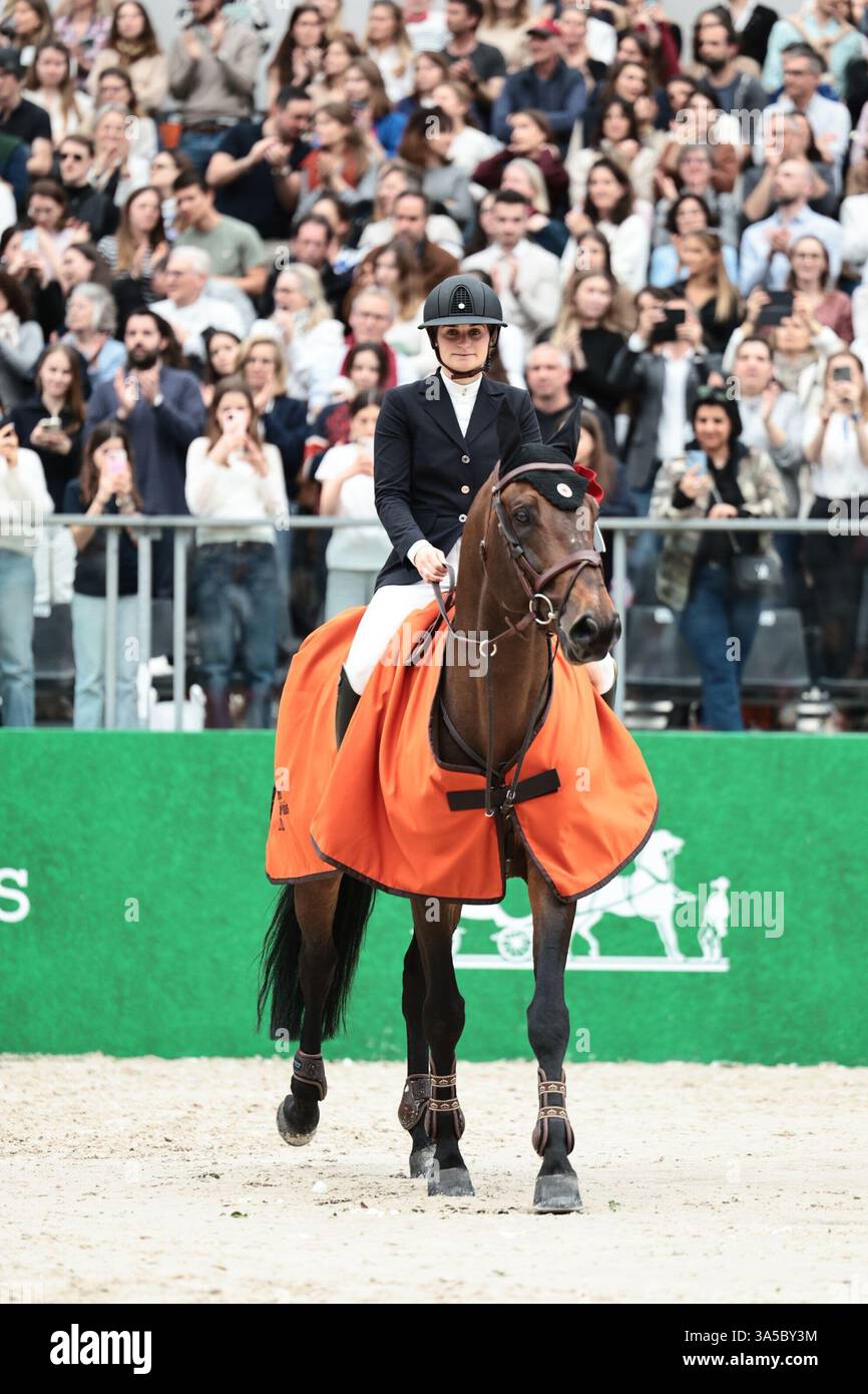Jeanne SADRAN of France with Dexter de kerglenn during the Saut Hermès ...