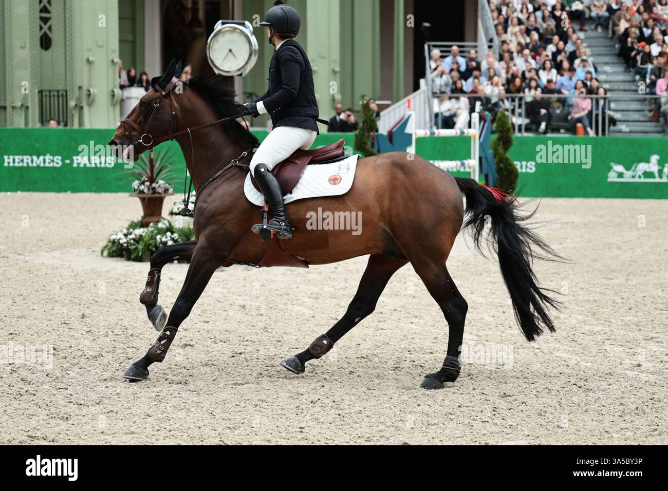 Jeanne SADRAN of France with Dexter de kerglenn during the Saut Hermès ...