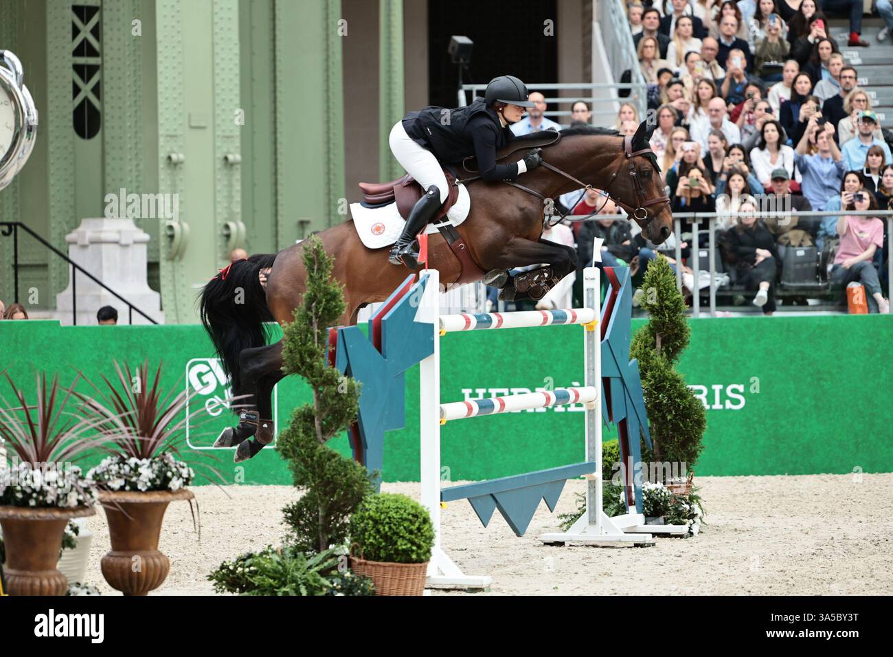 Jeanne SADRAN of France with Dexter de kerglenn during the Saut Hermès ...