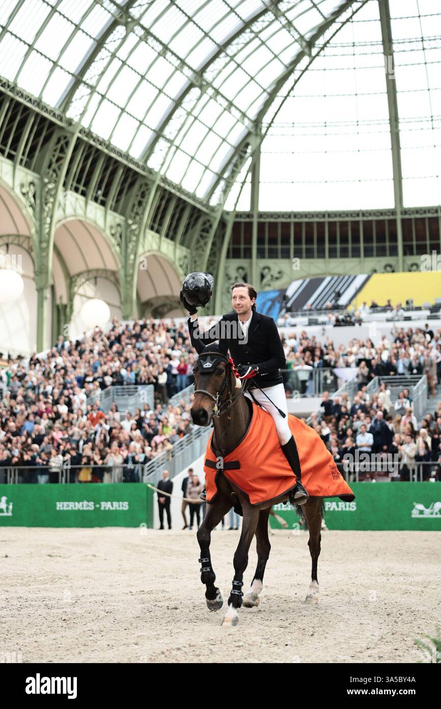 Martin FUCHS of Switzerland with Commissar pezi during the Saut Hermès ...