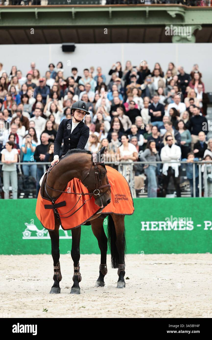 Jeanne SADRAN of France with Dexter de kerglenn during the Saut Hermès ...