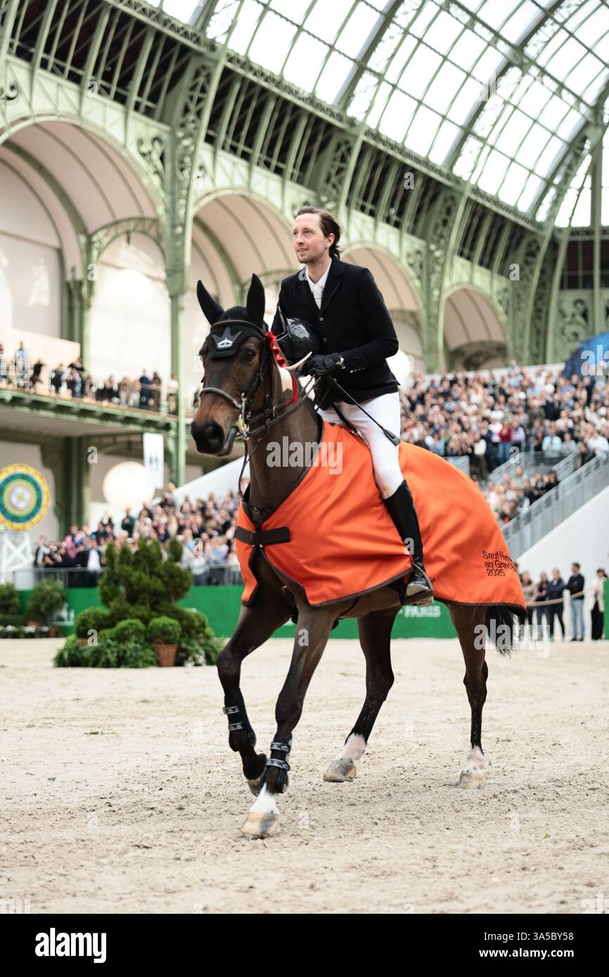 Martin FUCHS of Switzerland with Commissar pezi during the Saut Hermès ...