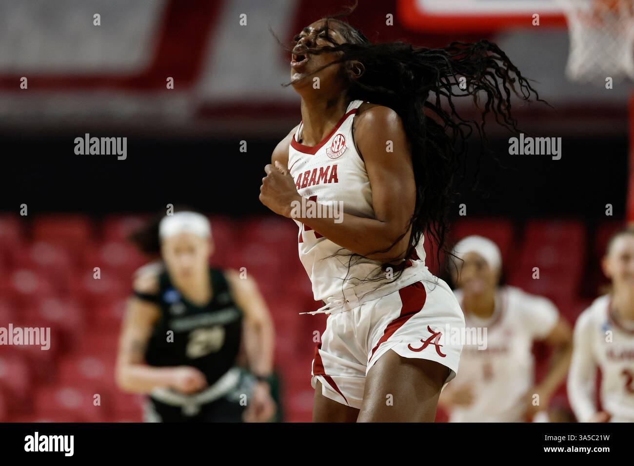 Alabama guard Zaay Green celebrates hitting a 3-point basket during the ...