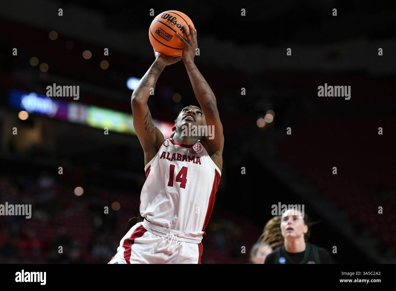 Alabama guard Zaay Green (14) goes to the basket during the first half ...