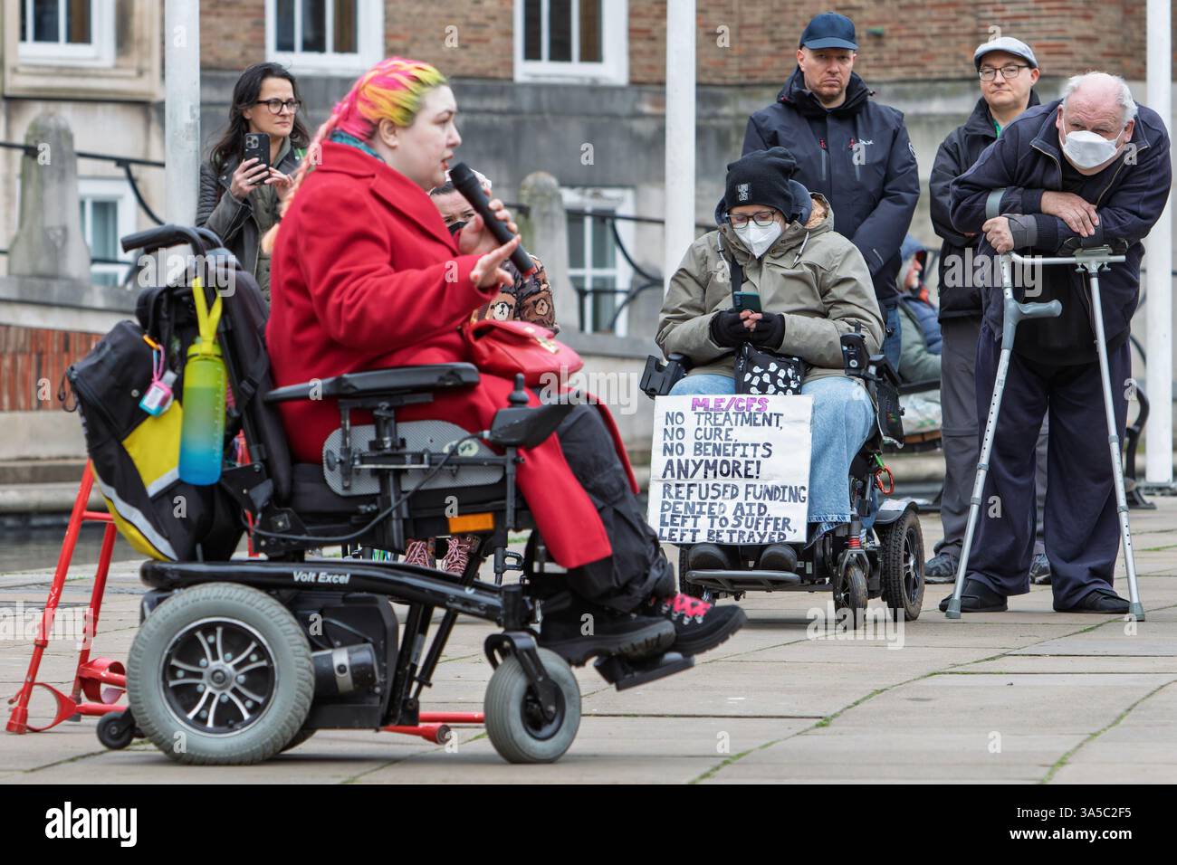 Woman protester in a wheelchair protesting hi-res stock photography and ...