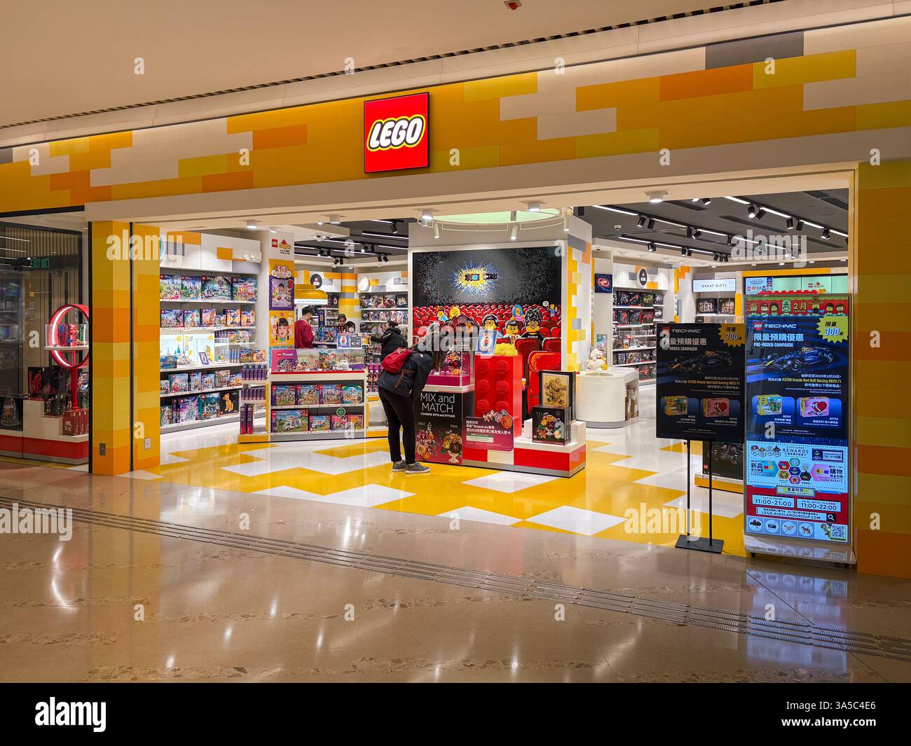 The Lego store entrance with shoppers browsing, showcasing the colorful ...
